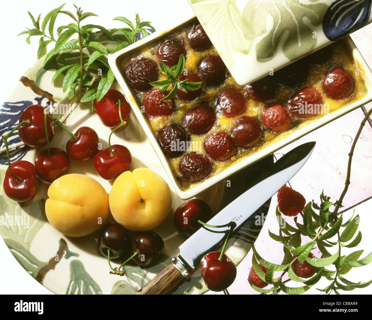 cherry clafoutis batter pudding Stock Photo - Alamy