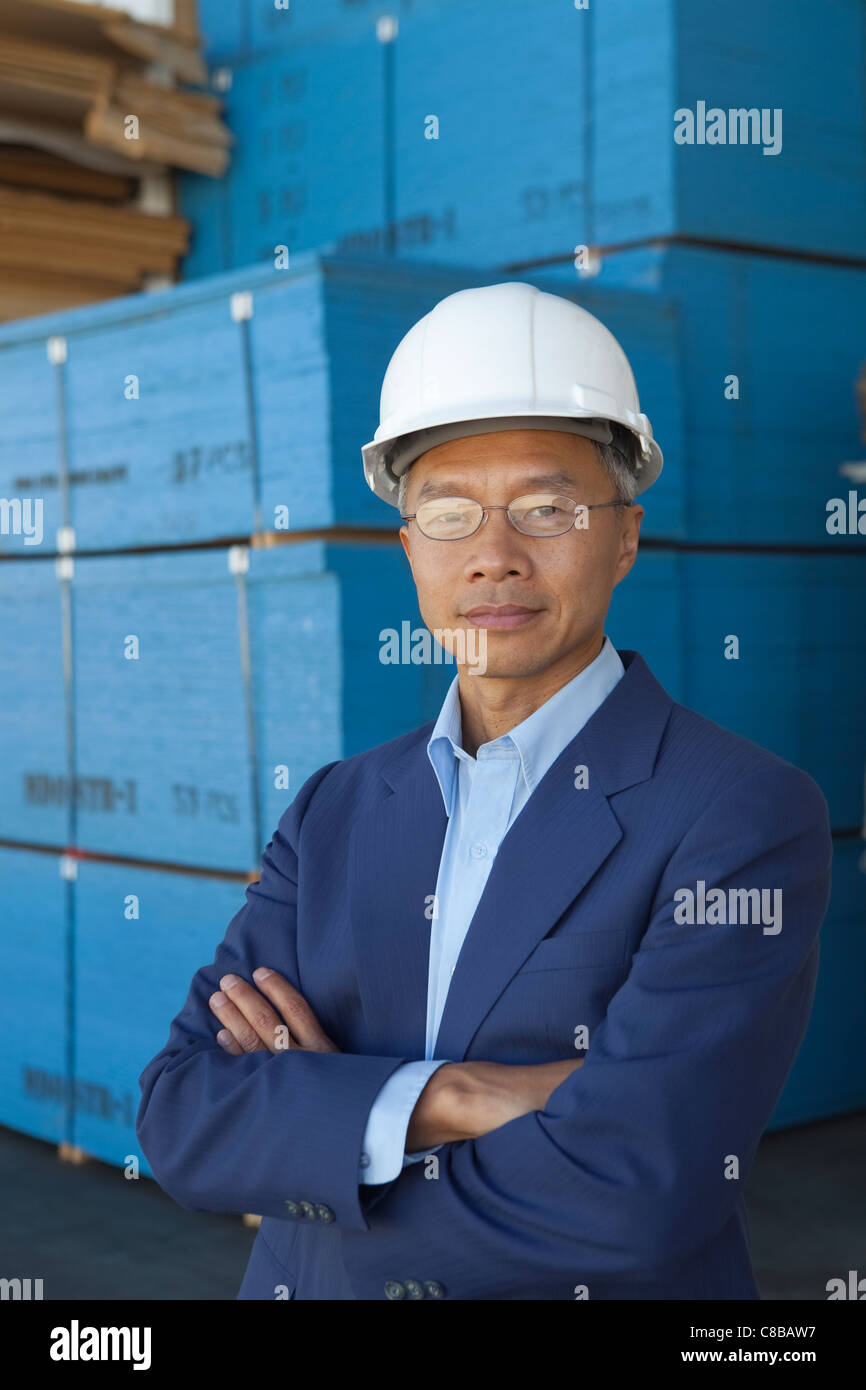 Warehouse manager wearing hard hat hi-res stock photography and images ...