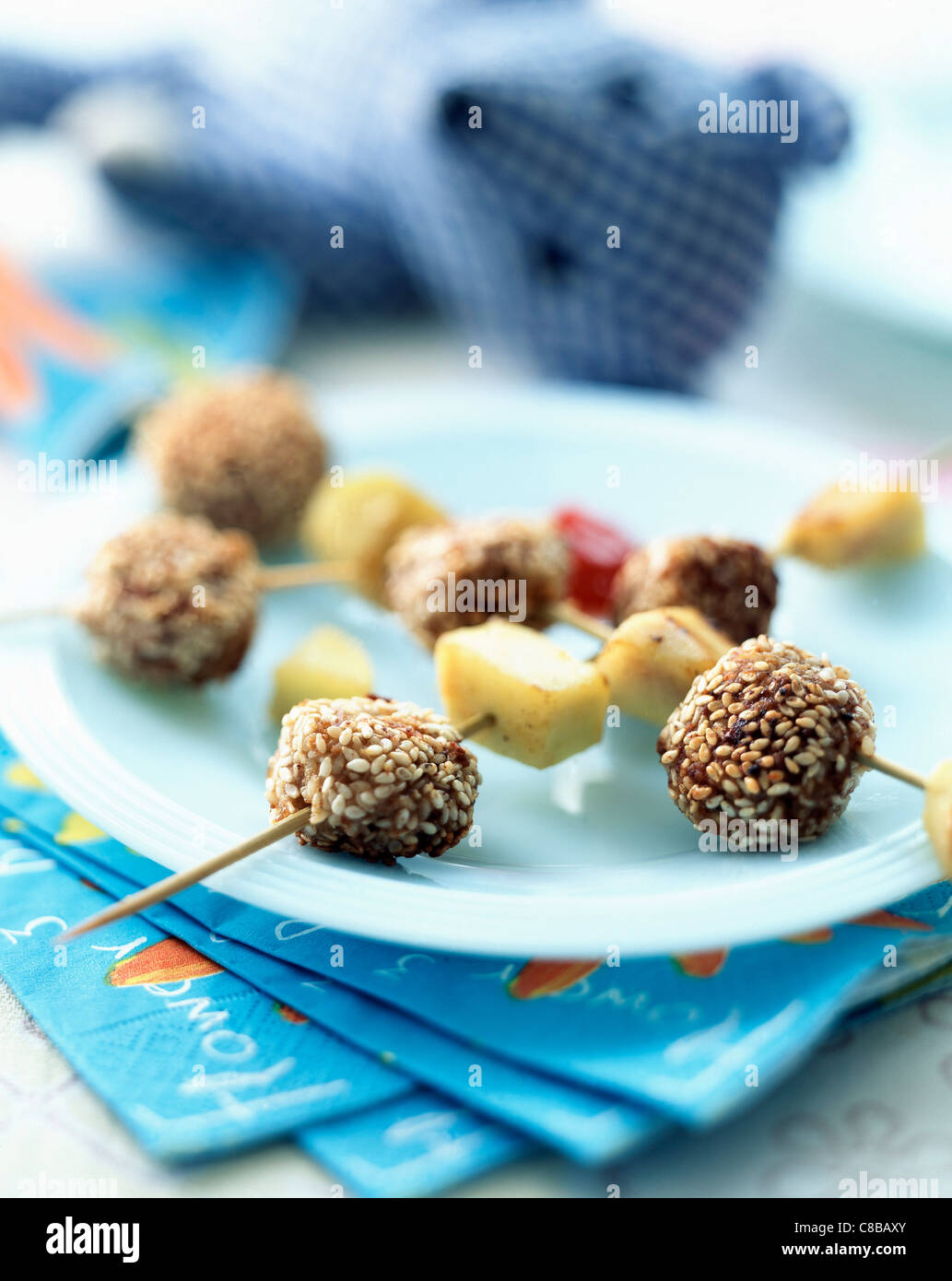 Mini beef and sesame seed kebabs Stock Photo - Alamy