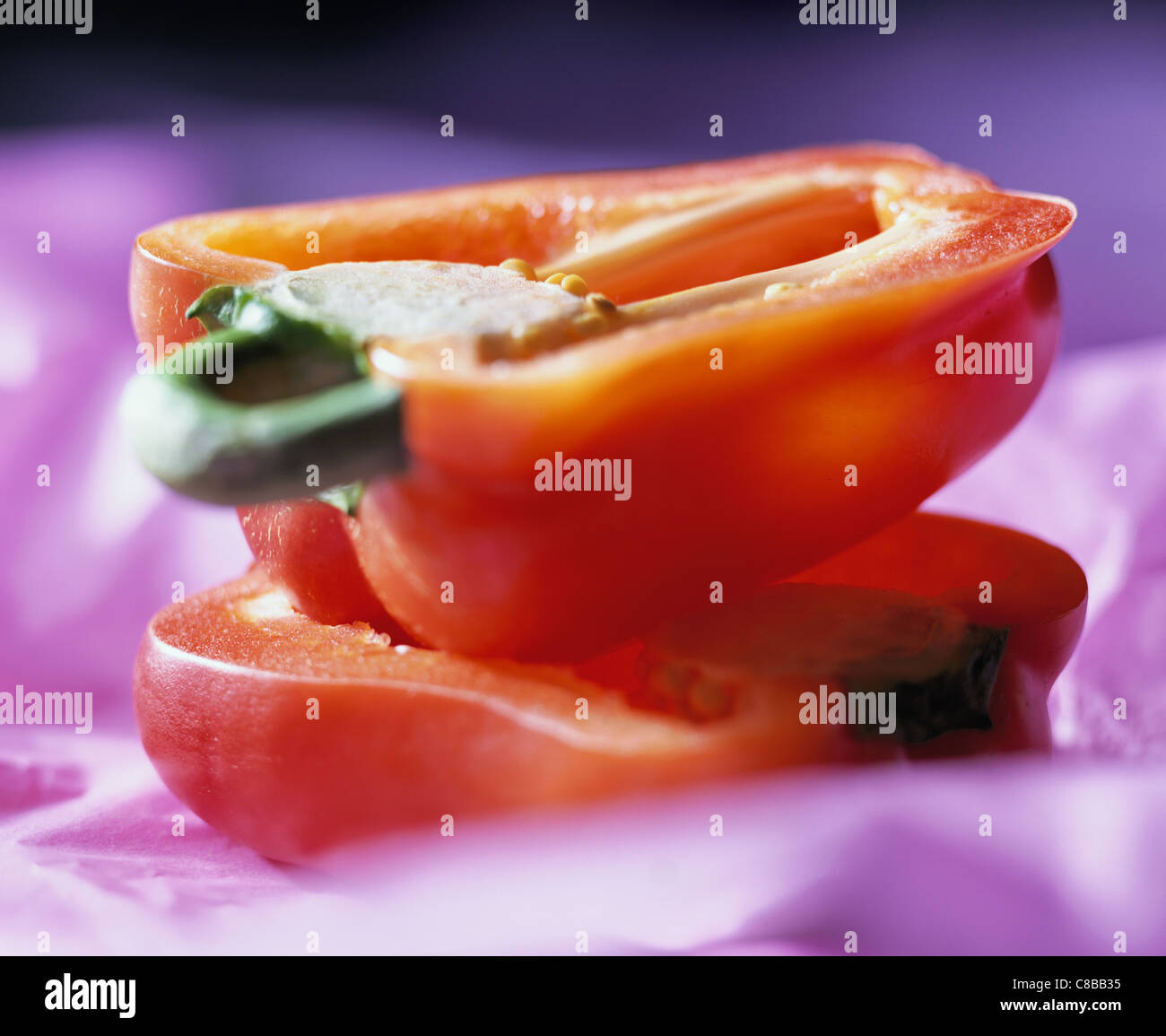 Red pepper cut in half Stock Photo - Alamy
