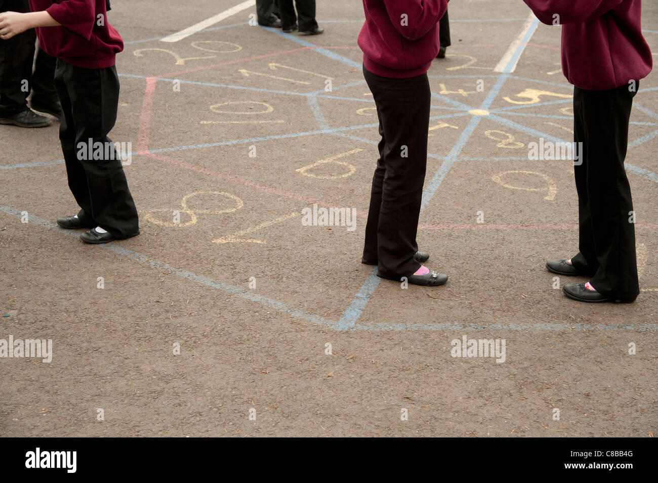 Primary school children playing in the playground Wales UK Stock Photo ...
