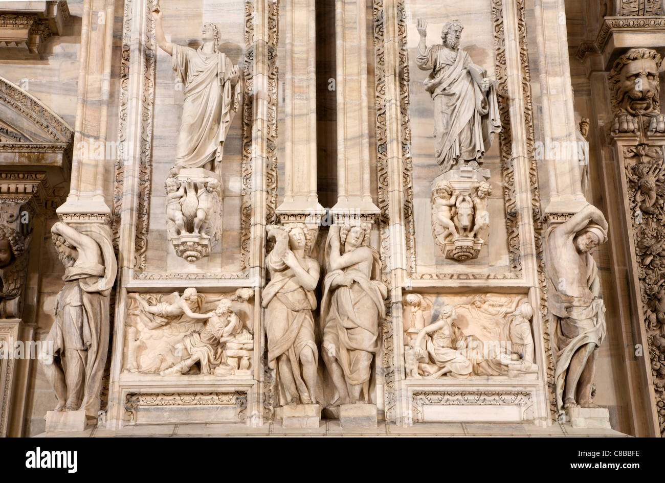 Milan - giants and apostles statue from west facade of Duomo cathedral ...