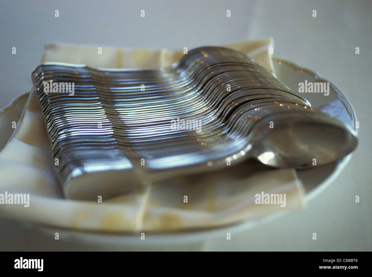 set of spoons on plate Stock Photo - Alamy