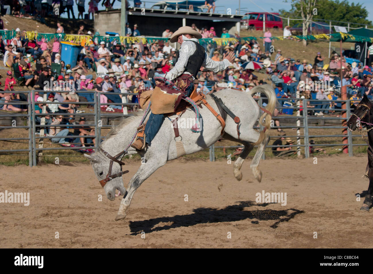 Saddle bronc ride at Dayboro country rodeo Stock Photo - Alamy