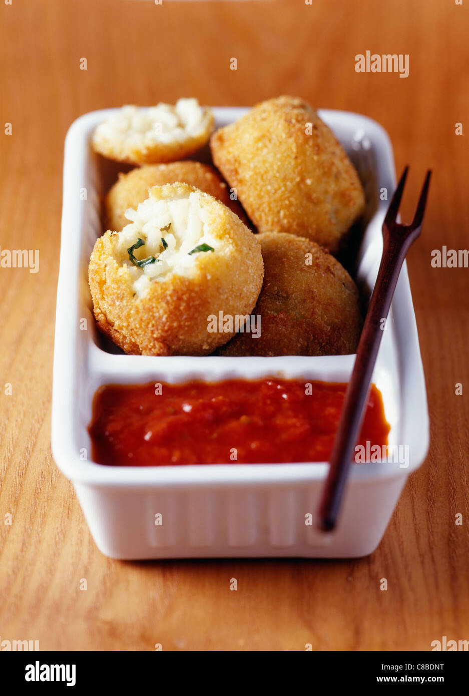 rice croquettes and tomato sauce Stock Photo - Alamy