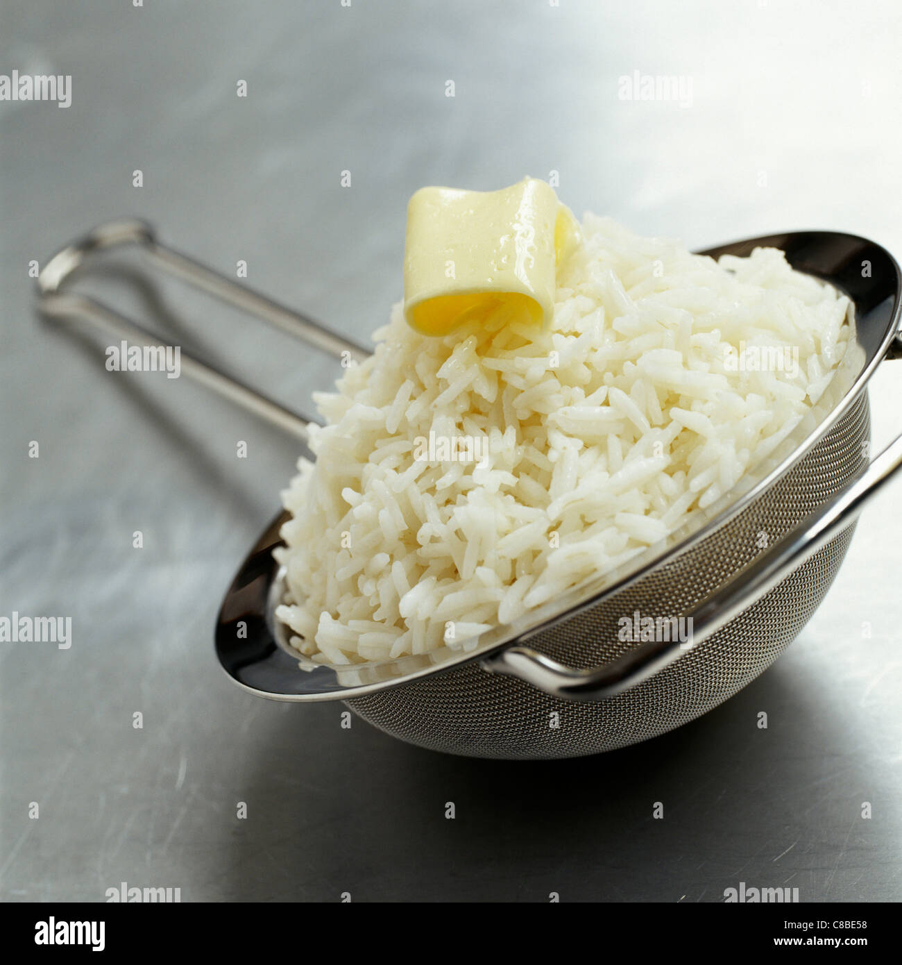 rice in sieve Stock Photo - Alamy