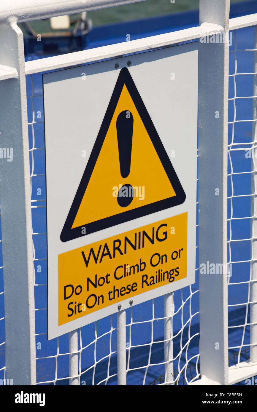 Warning do not climb on or sit on these railings sign on Wightlink ...