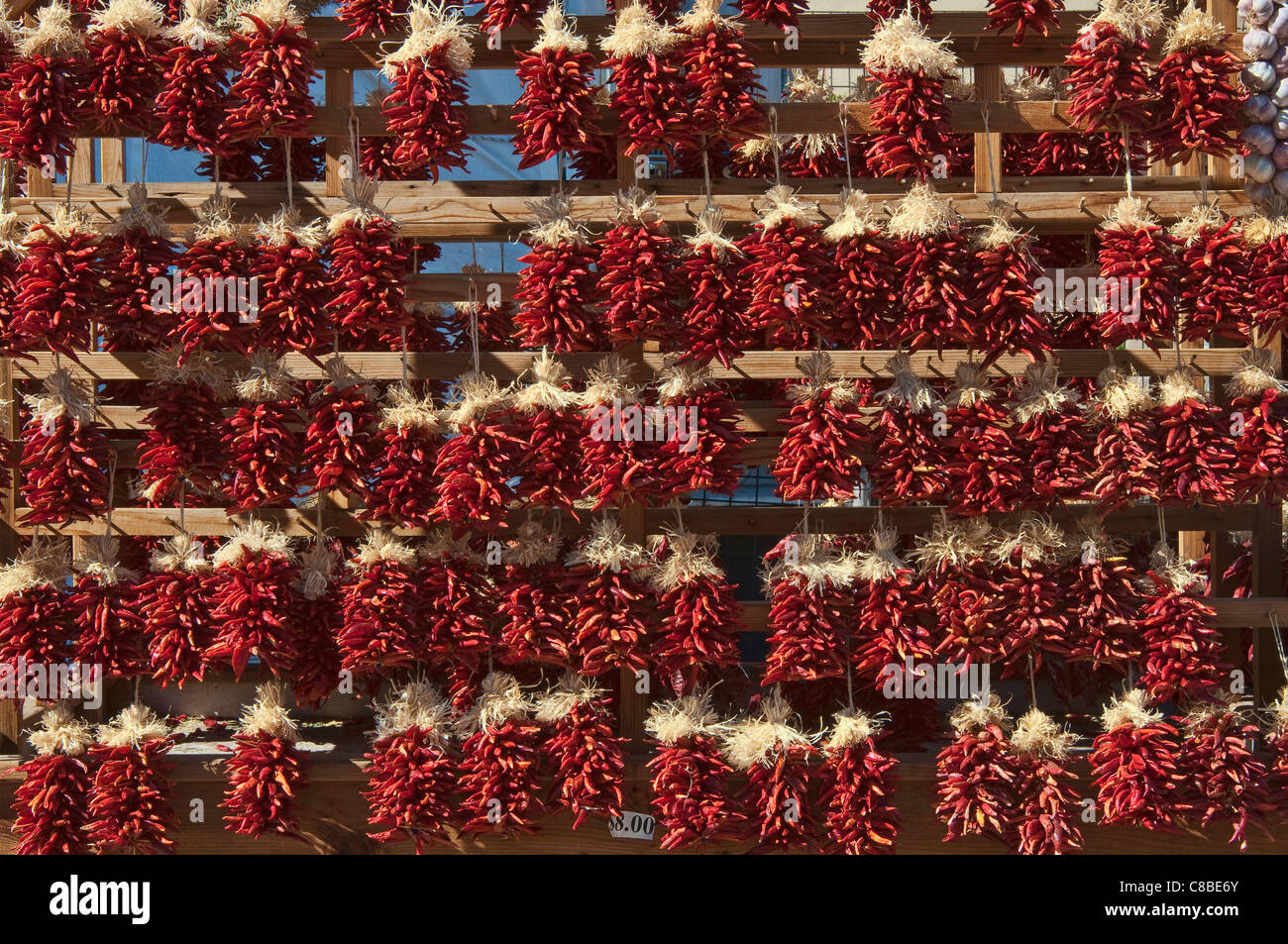 Chili ristras (red peppers) on vendor stall in Santa Fe, New Mexico ...