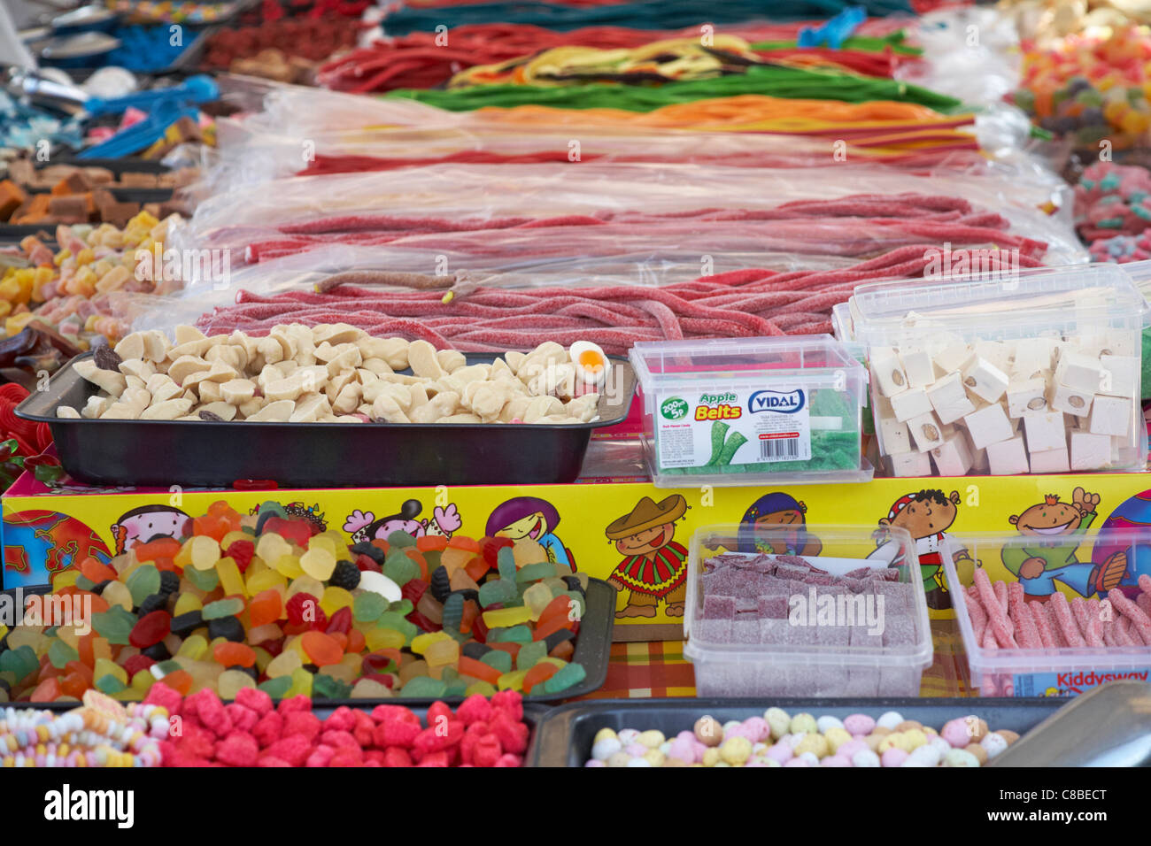 Selection of sweets in sweet kiosk stall Stock Photo - Alamy