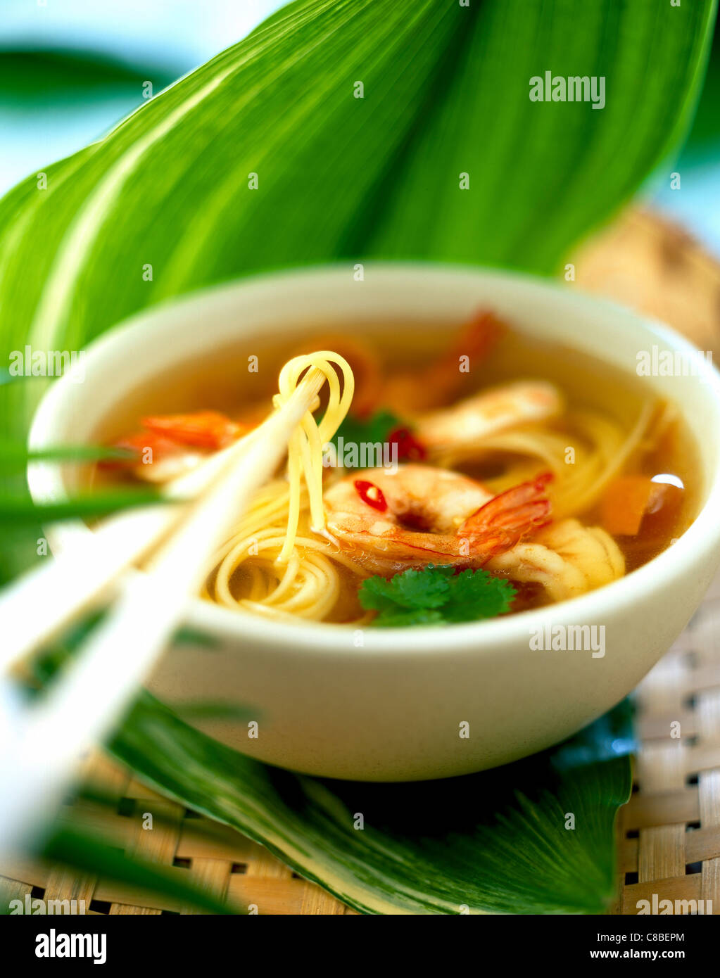 Chinese prawn and noodle soup Stock Photo - Alamy