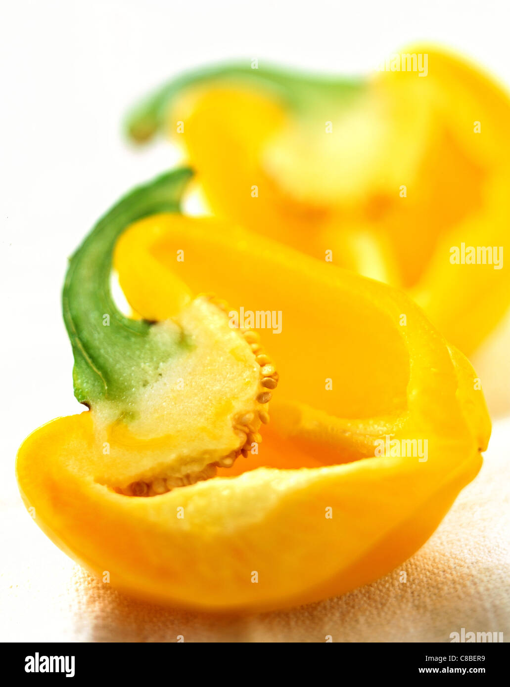 sliced yellow peppers Stock Photo - Alamy