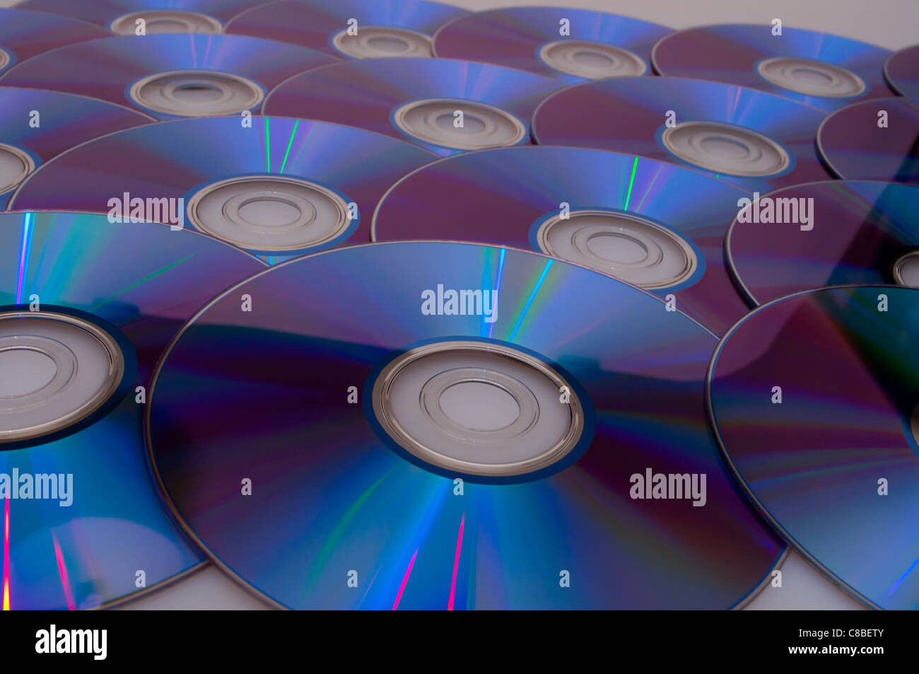 Background of Many Glowing CD Compact Discs Stock Photo - Alamy