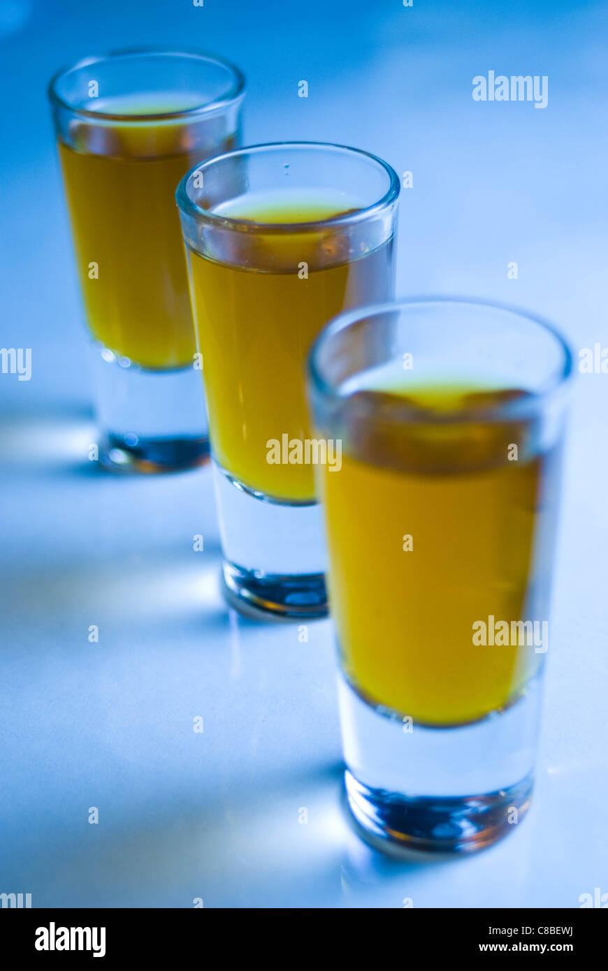 Alcoholic drink (rum) in shot glasses Stock Photo - Alamy