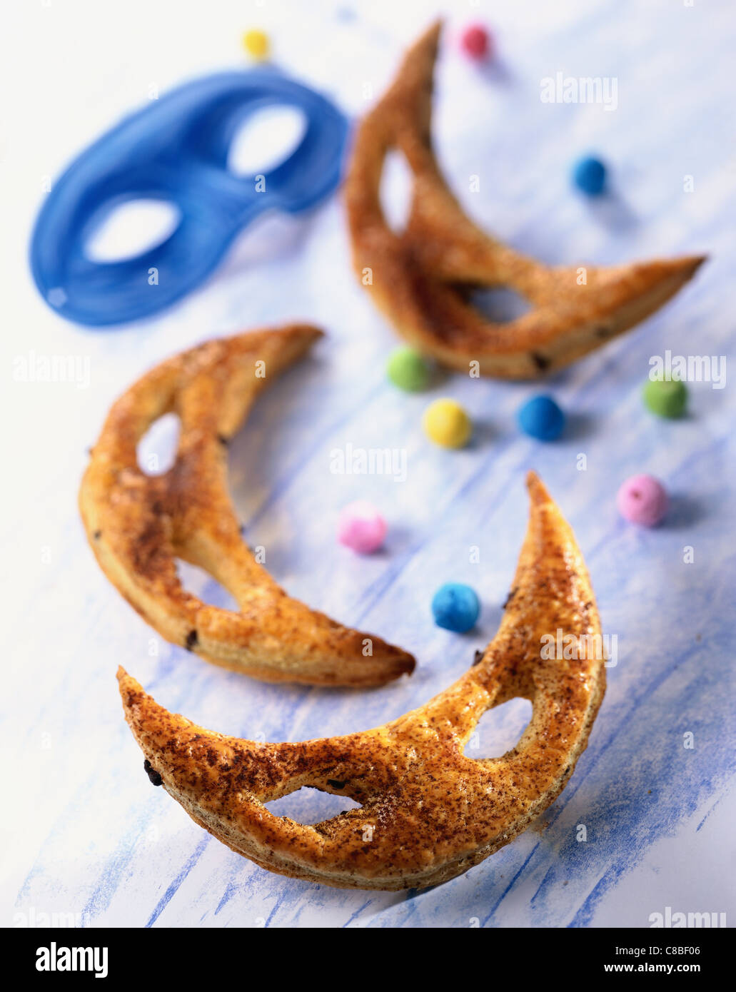 sweet puff pastry carnival masks Stock Photo - Alamy