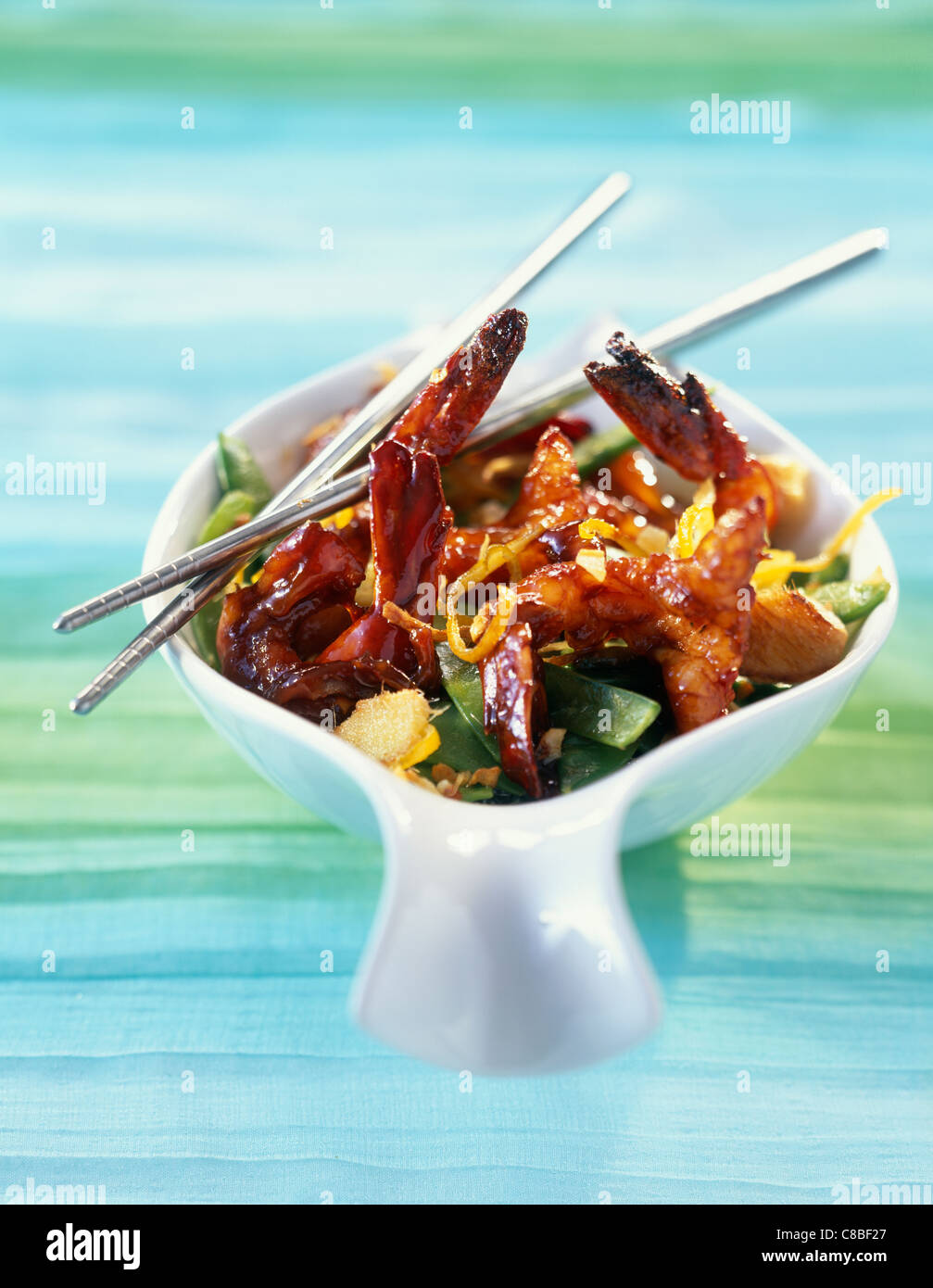 caramelized gamba prawns with crunchy vegetables Stock Photo - Alamy