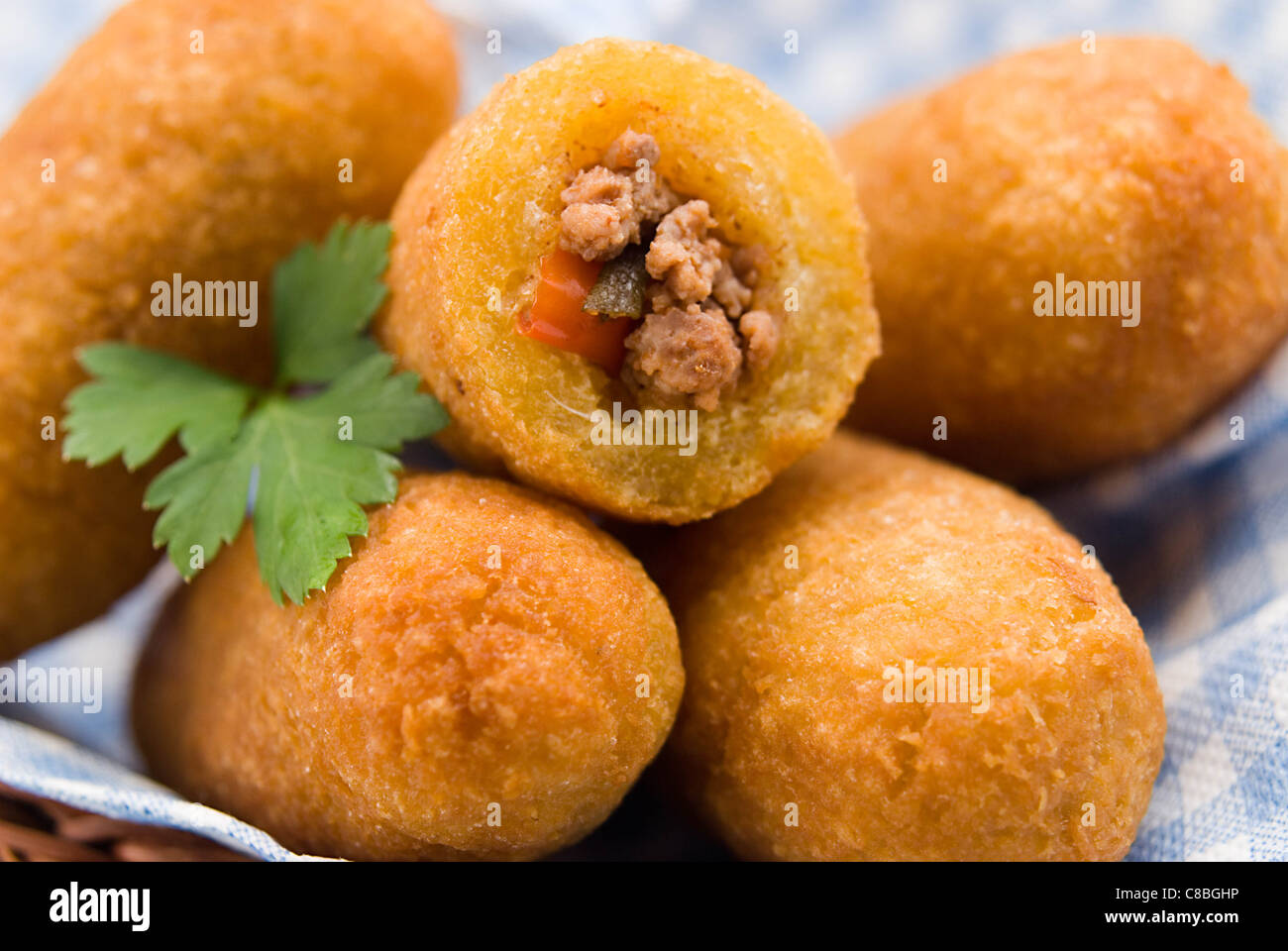 Cassava rolls filled with spicy beef Stock Photo - Alamy
