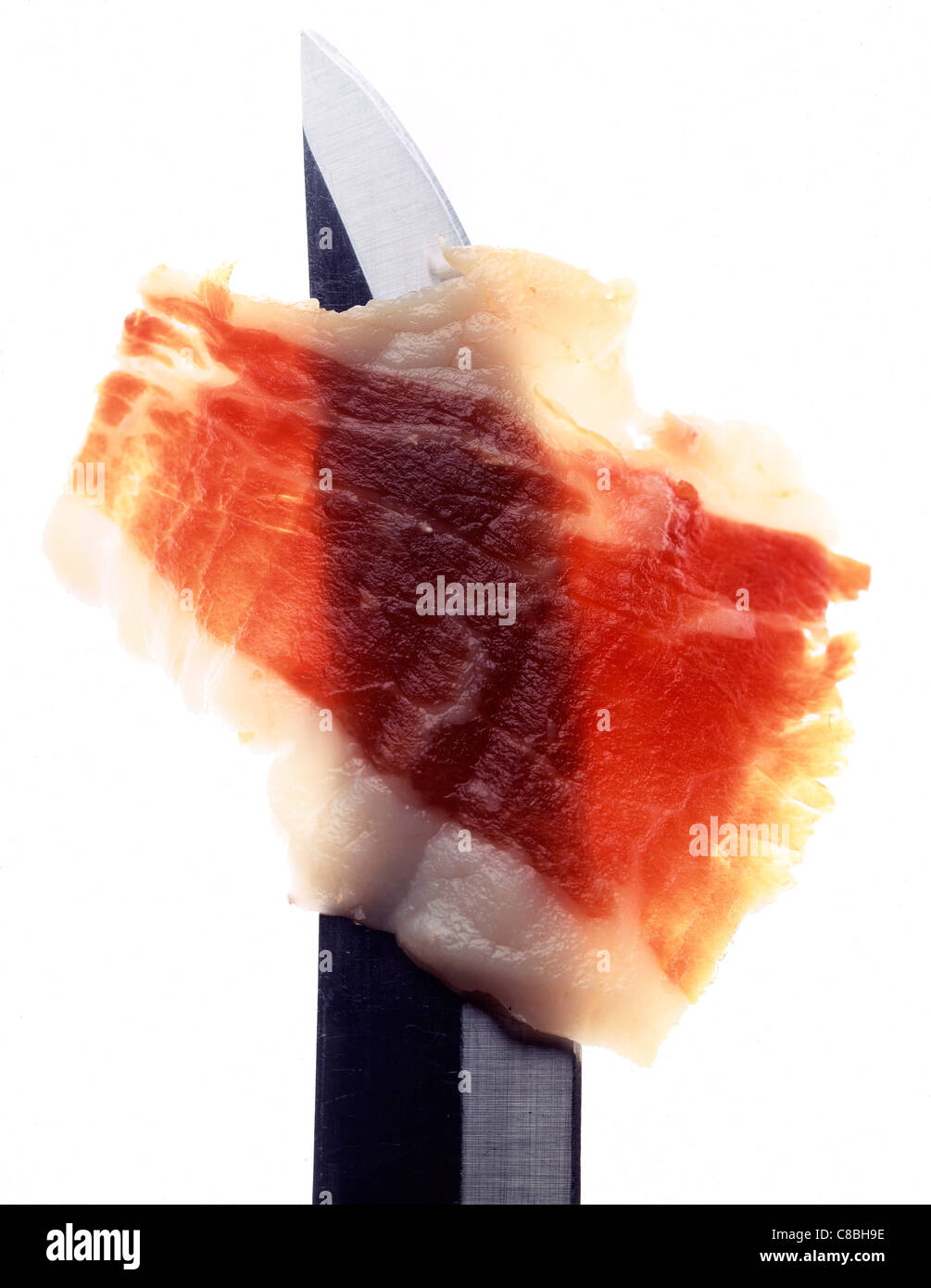 slice of smoked ham and knife Stock Photo - Alamy