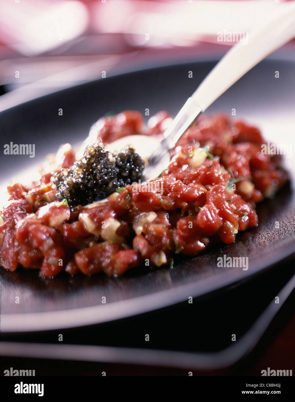 Beef tartare with caviar Stock Photo - Alamy