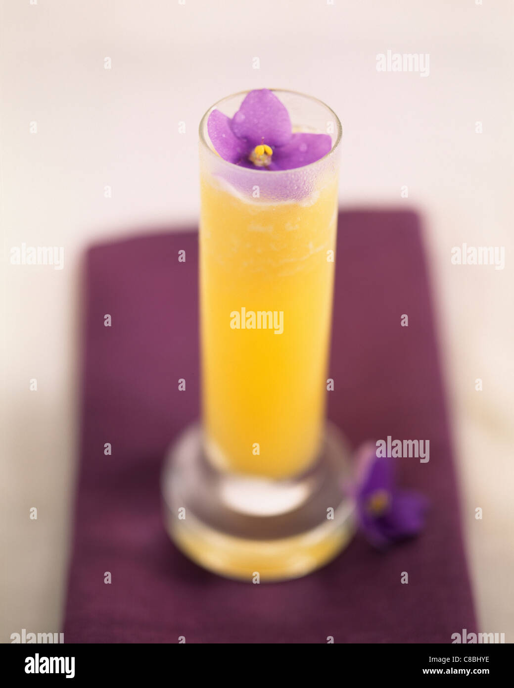pineapple juice with violet Stock Photo - Alamy