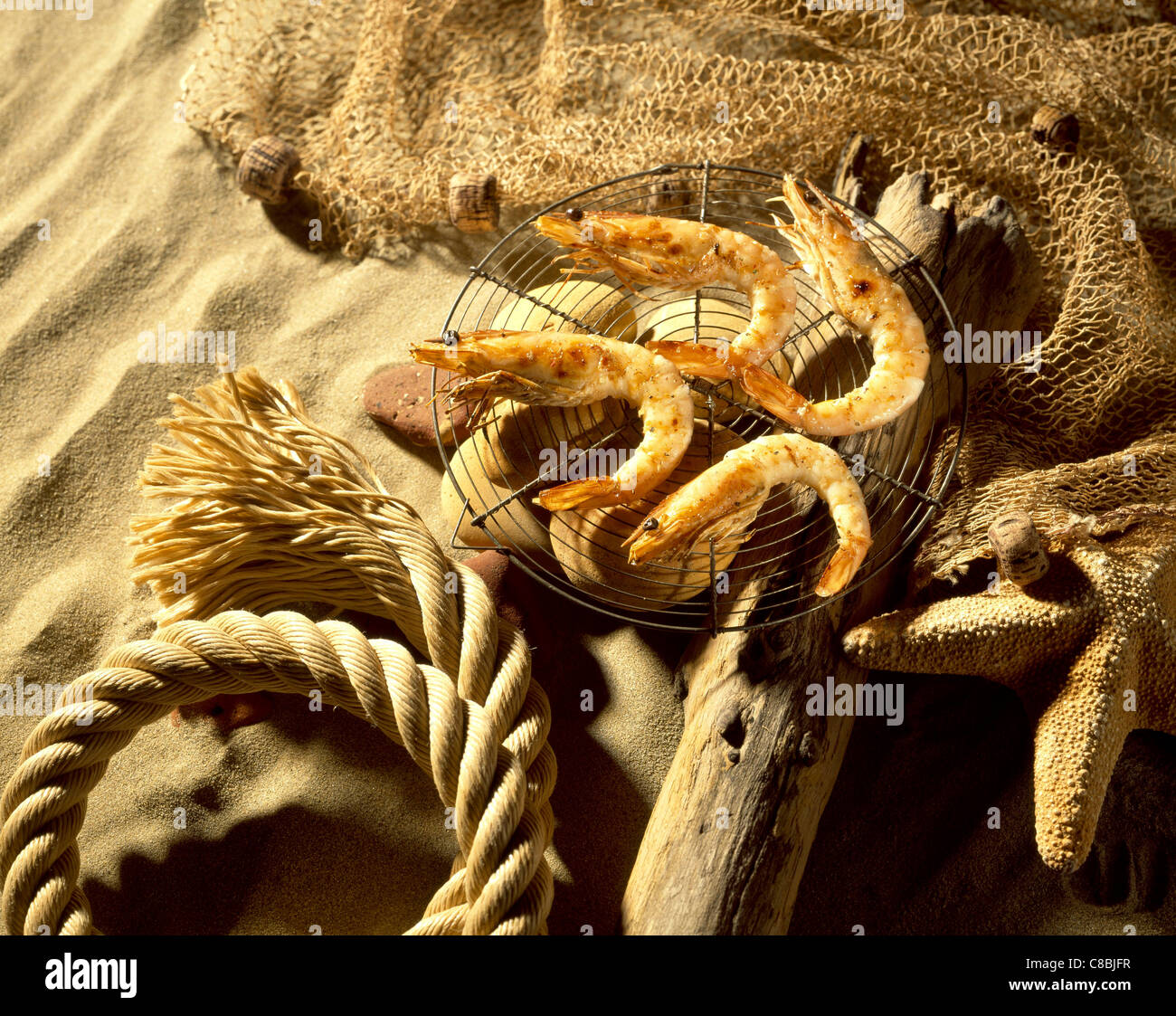 rum-flambéed mediterranean prawns Stock Photo - Alamy
