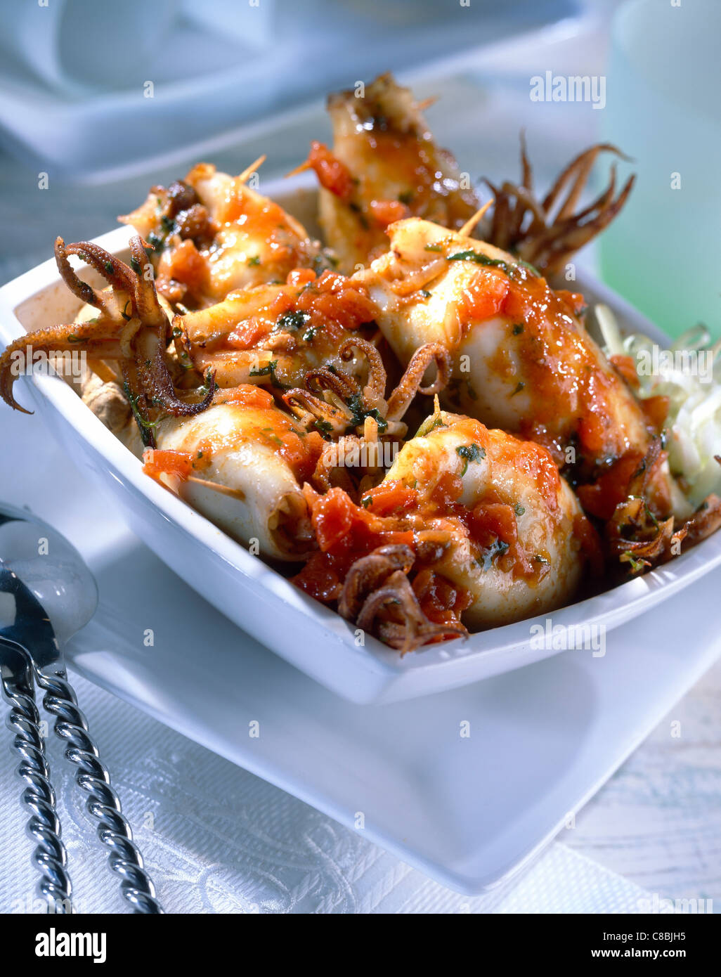 Squid stuffed with dried fruit and spices Stock Photo - Alamy