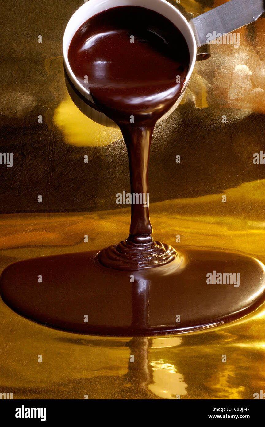 pouring melted chocolate Stock Photo - Alamy