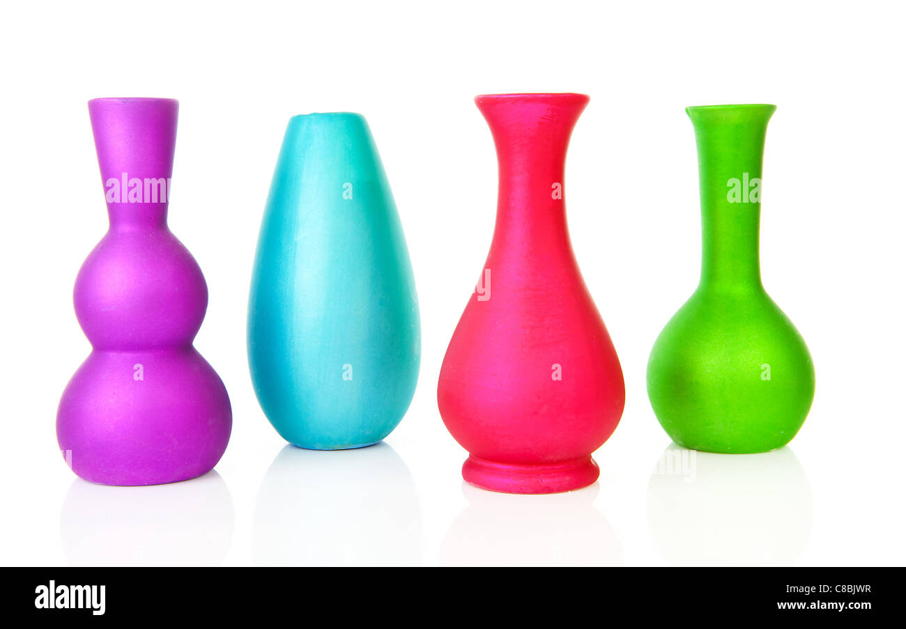 Four colorful empty vases over white background Stock Photo - Alamy