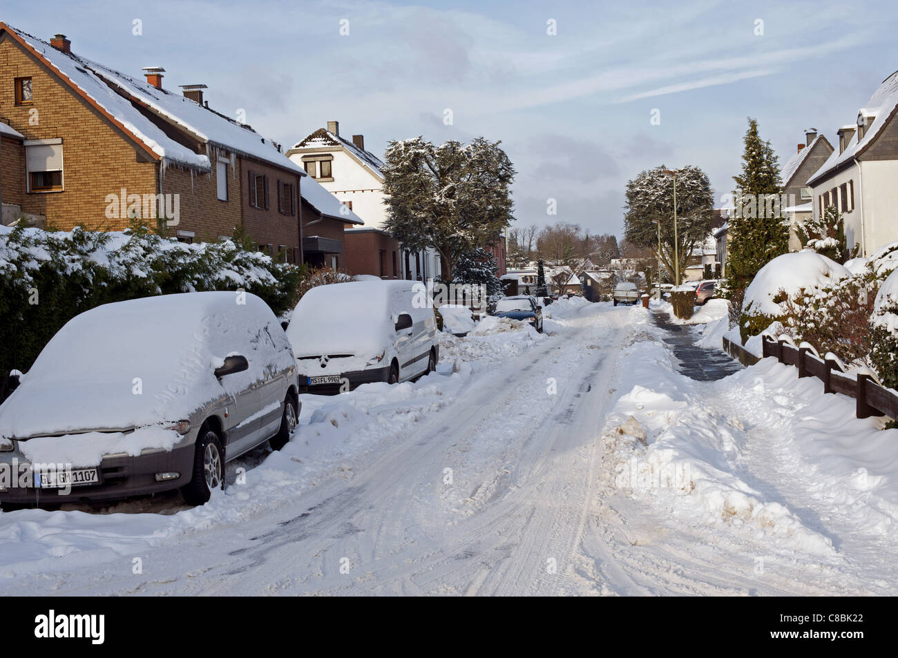 Snow covered street Stock Photo - Alamy