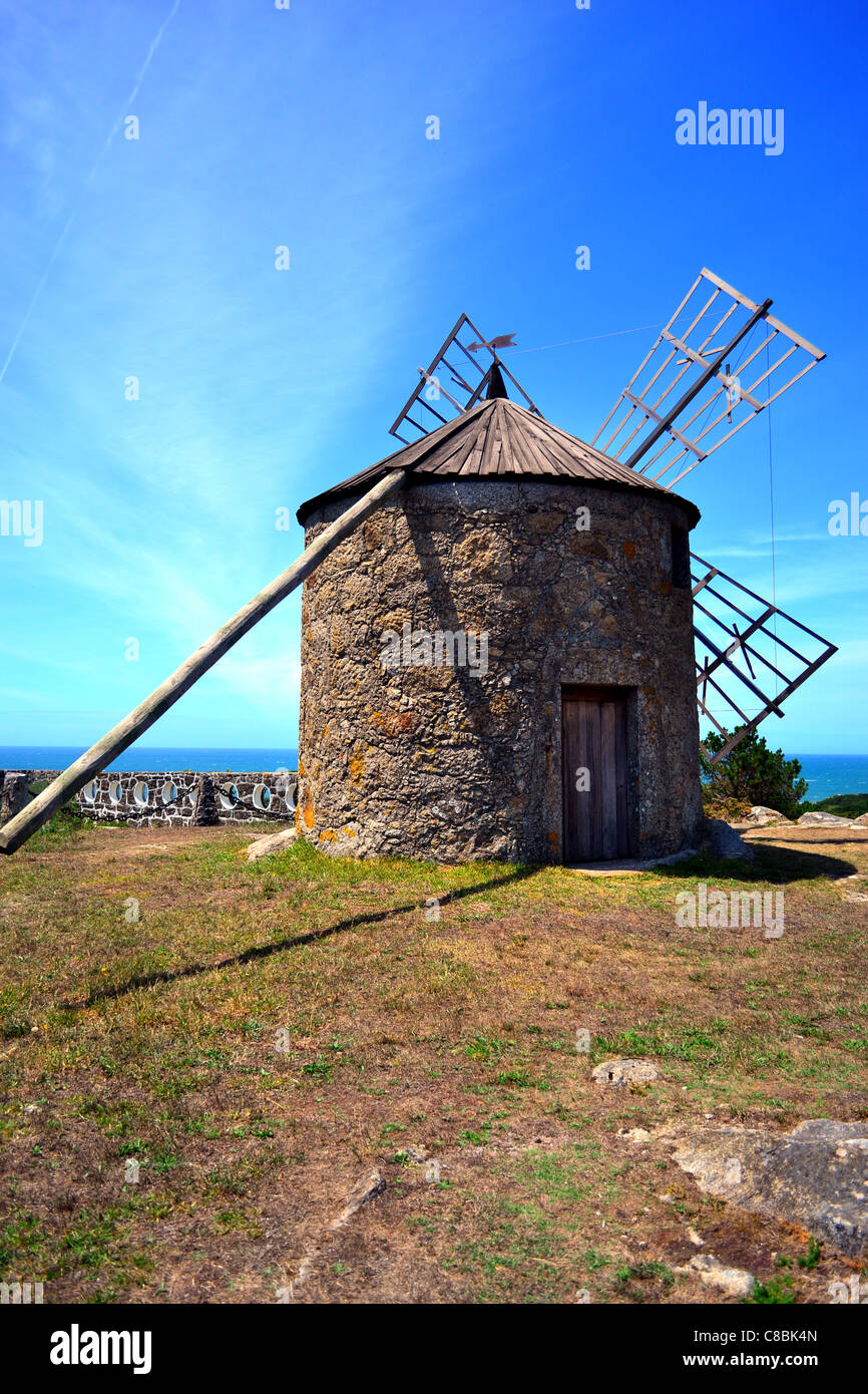 Old windmill on the coast Stock Photo - Alamy