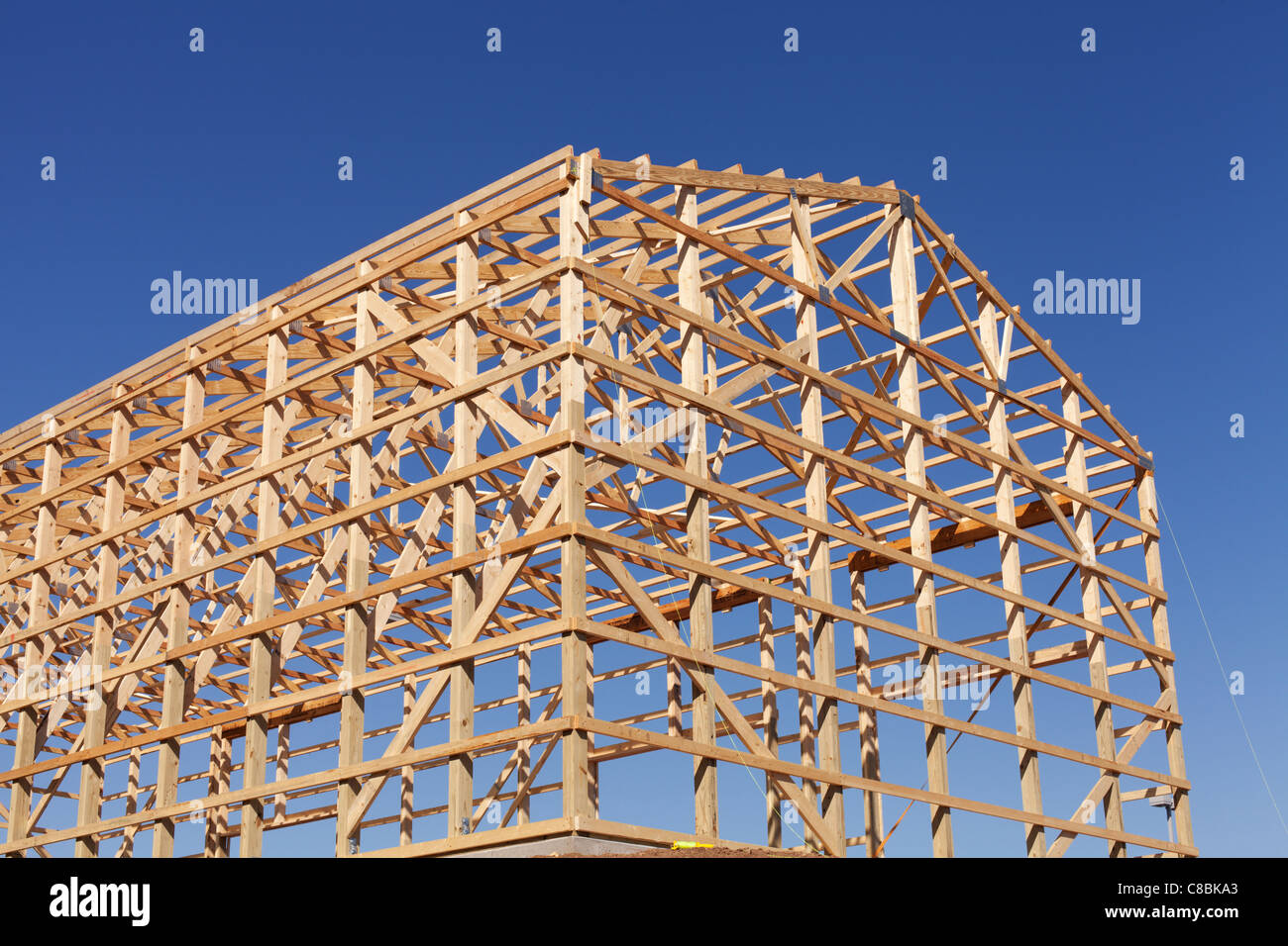 Wooden framing of a large structure under construction Stock Photo - Alamy