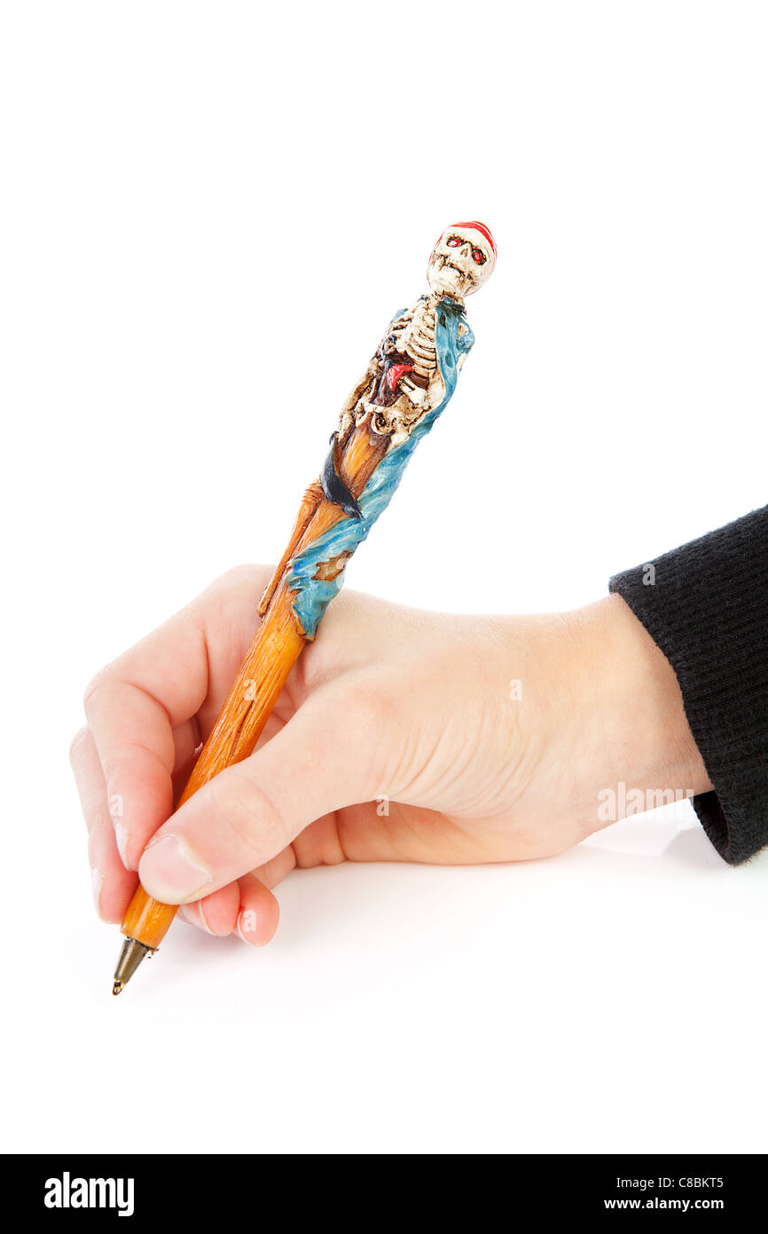 Hand holfing pirate pen over white background Stock Photo - Alamy