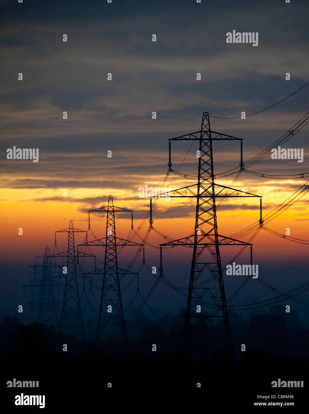 Row of Pylons Stock Photo - Alamy