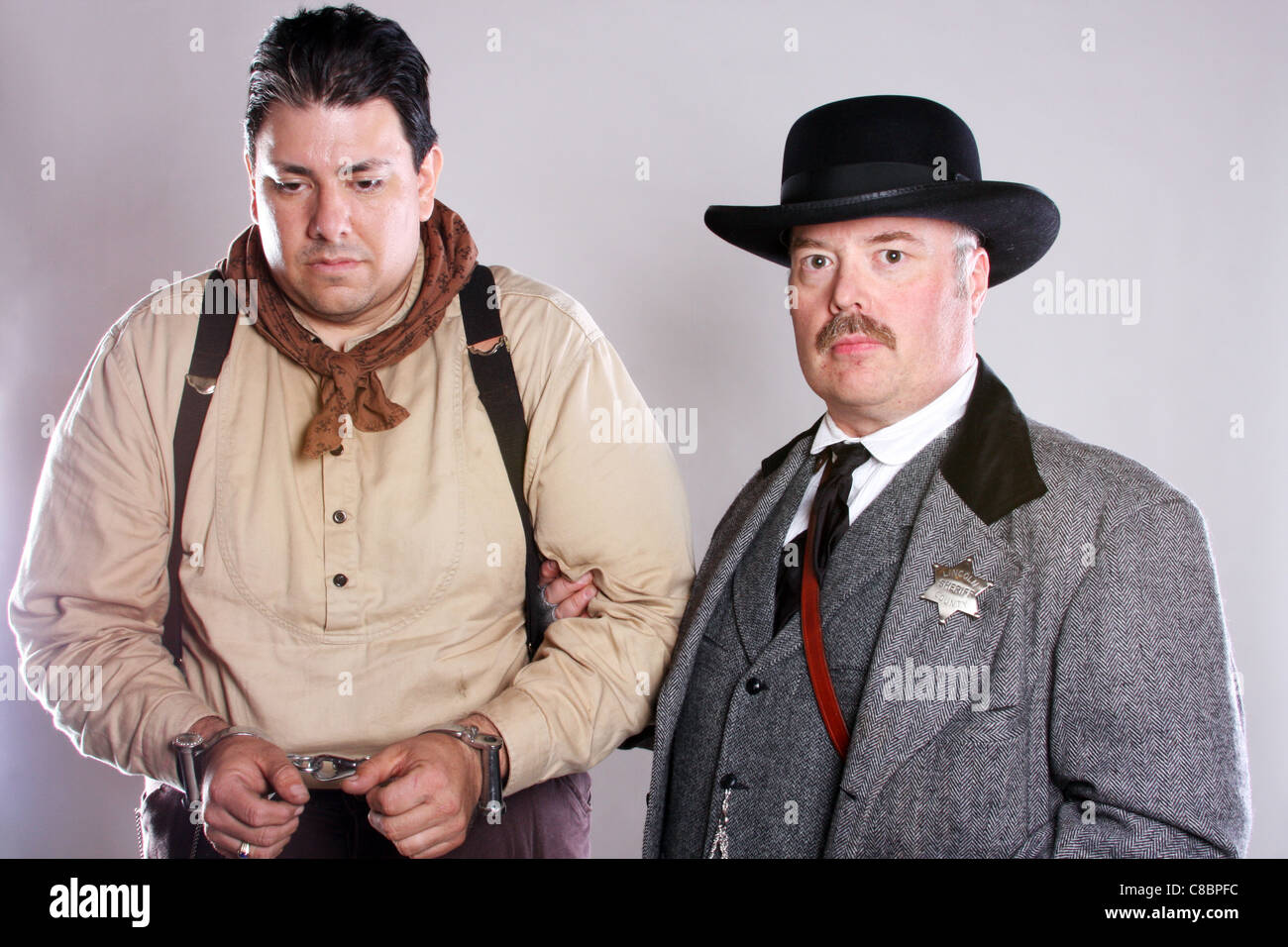 A cowboy under arrest Stock Photo - Alamy