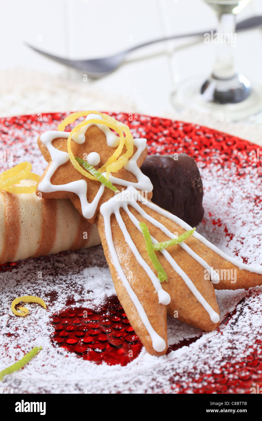 Chocolate dipped wafer cookie and gingerbread comet Stock Photo - Alamy