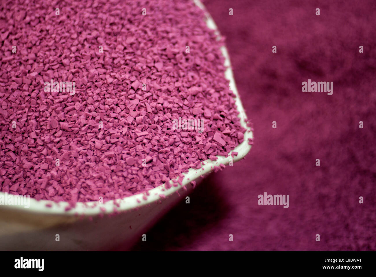 Pink plastic "nurdles" (shredded plastic raw materials Stock Photo - Alamy