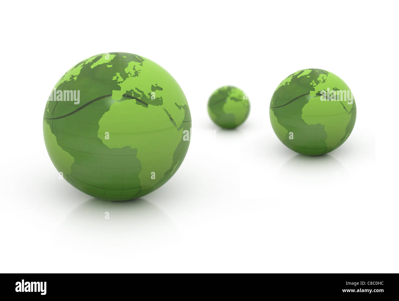 Three green World globe on white background Stock Photo - Alamy