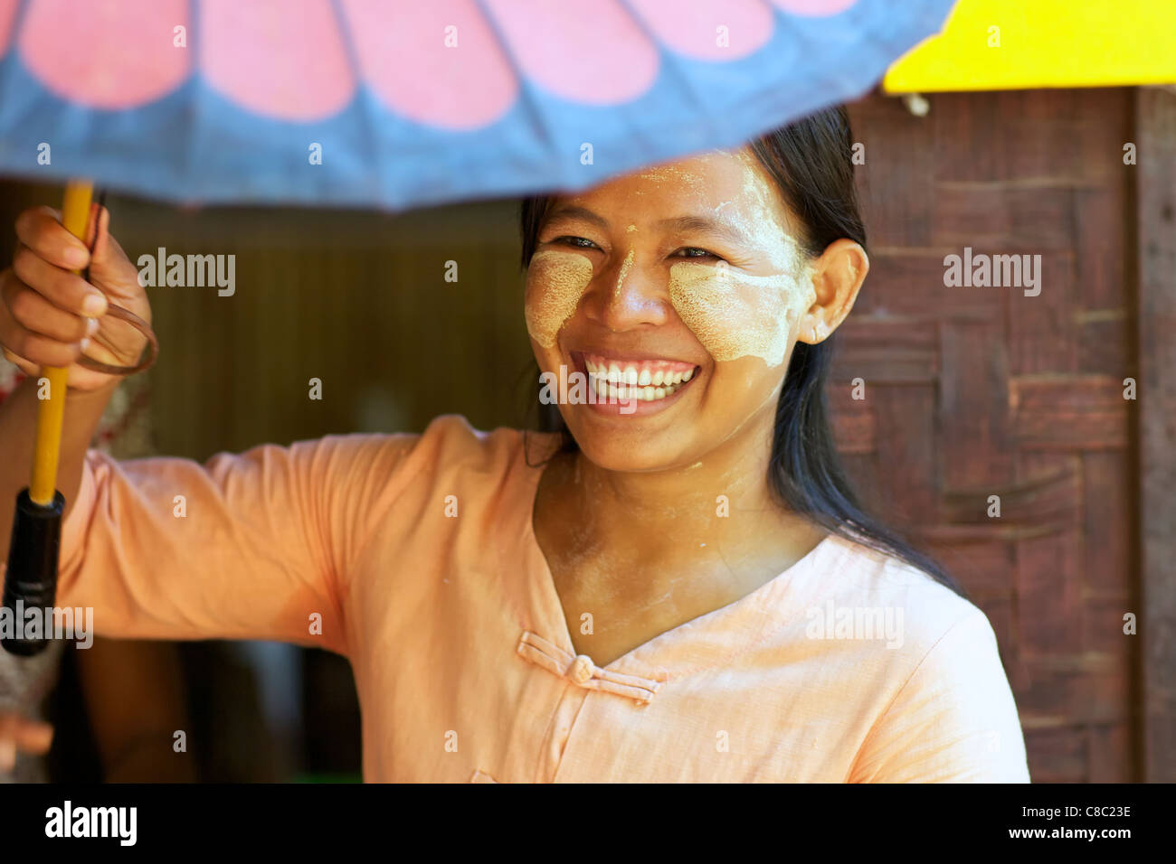 Unidentified woman wearing traditional Thanaka cream in Bagan, Myanmar ...
