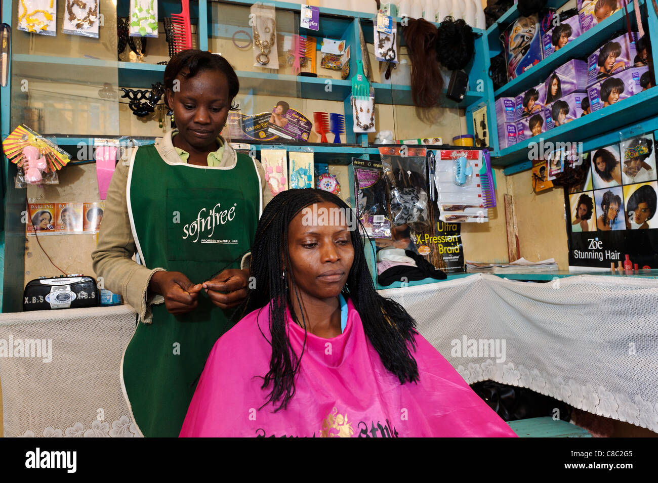 Trainee hairdresser in a salon, Thika, Kenya Stock Photo - Alamy