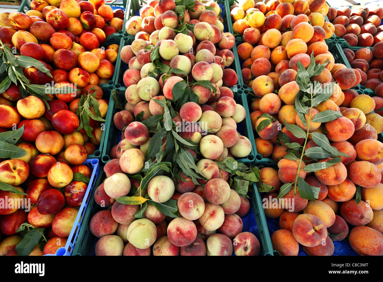 Peaches on sale at the street market in Sulmona, Italy Stock Photo - Alamy