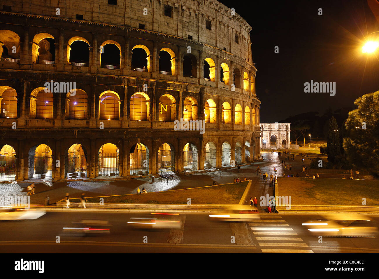 Traffic passing the Colosseum in Rome, Italy Stock Photo - Alamy