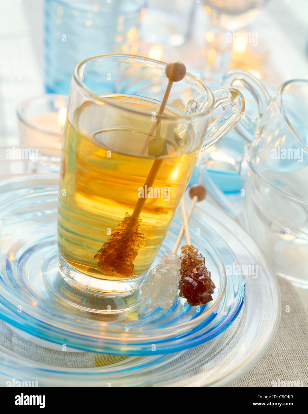 herb tea and sugar sticks Stock Photo - Alamy