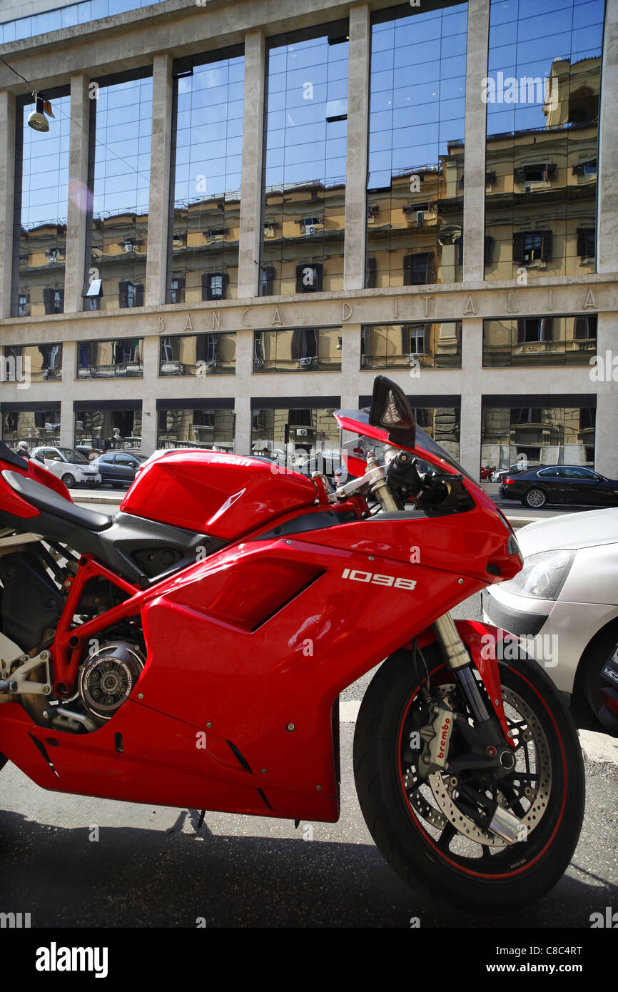 A Ducati motorcycle parked across from Italy's National Bank, Banca D ...