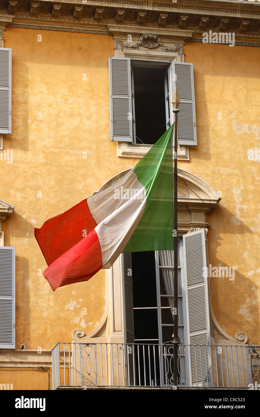 The Italian flag flies from a building Stock Photo - Alamy