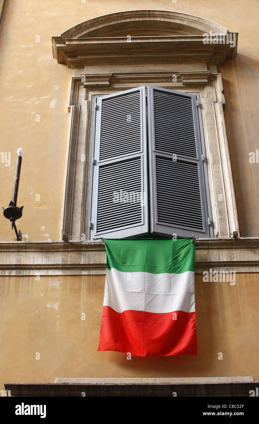 The Italian flag flies from a building Stock Photo - Alamy