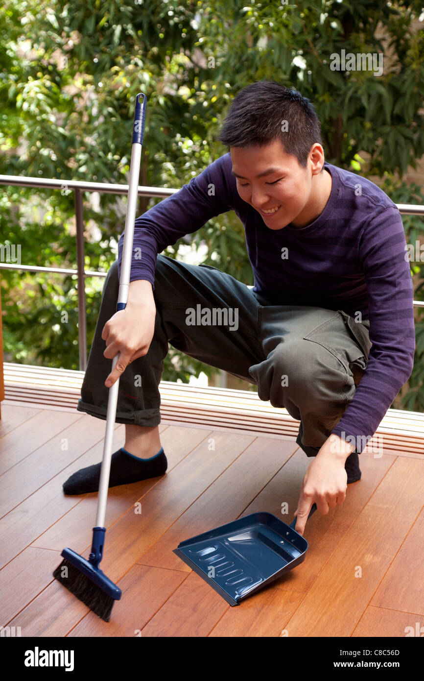 Man Sweeping Black High Resolution Stock Photography and Images - Alamy