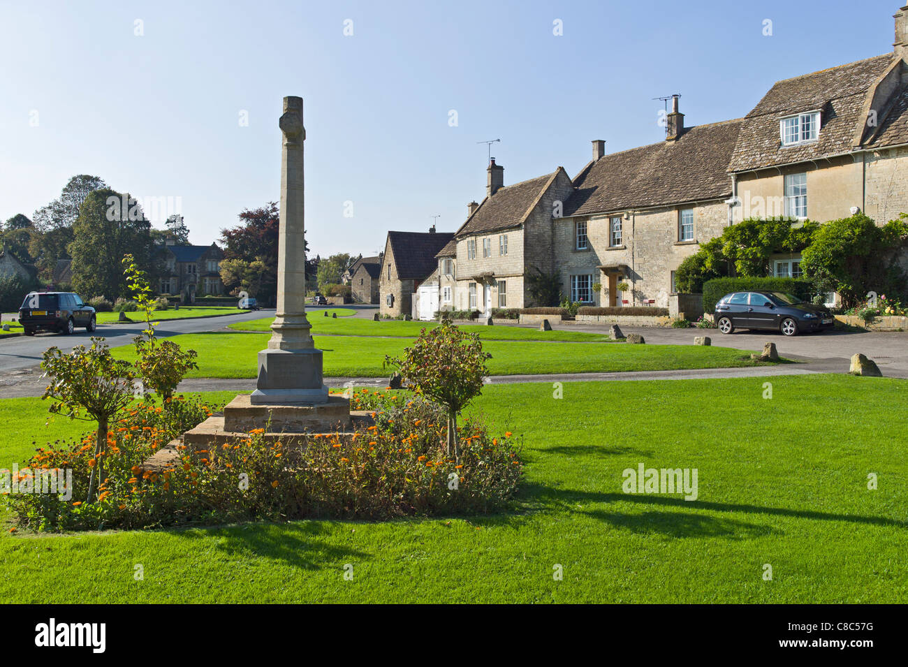 Village green and memorial cross in Biddestone Wiltshire UK Stock Photo ...