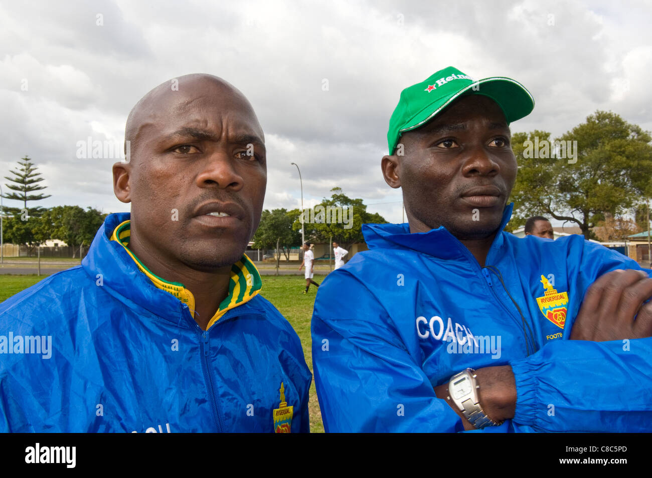 Football coaches of an U13 team watching a football match Cape Town ...