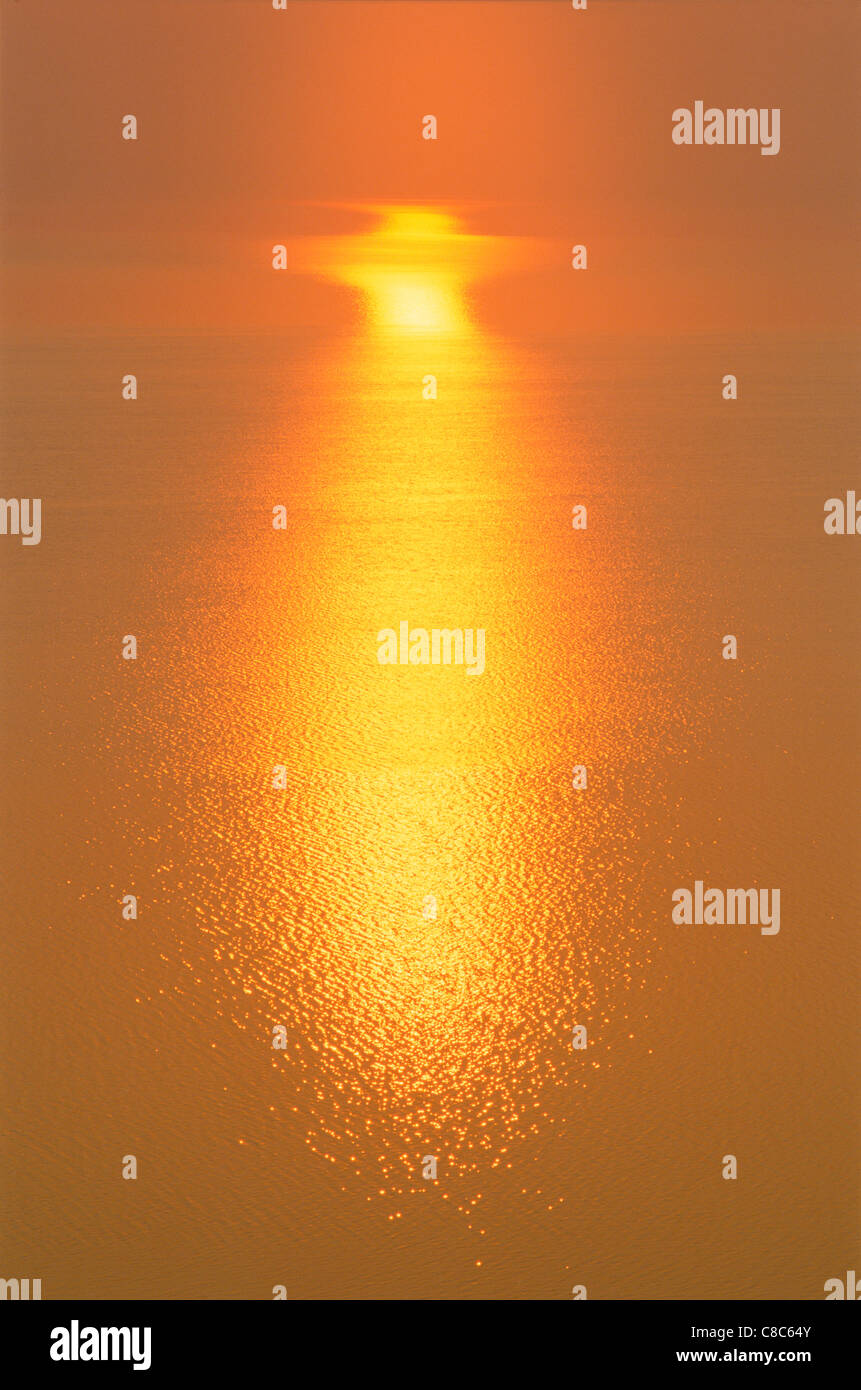 Sunset reflection over water hi-res stock photography and images - Alamy