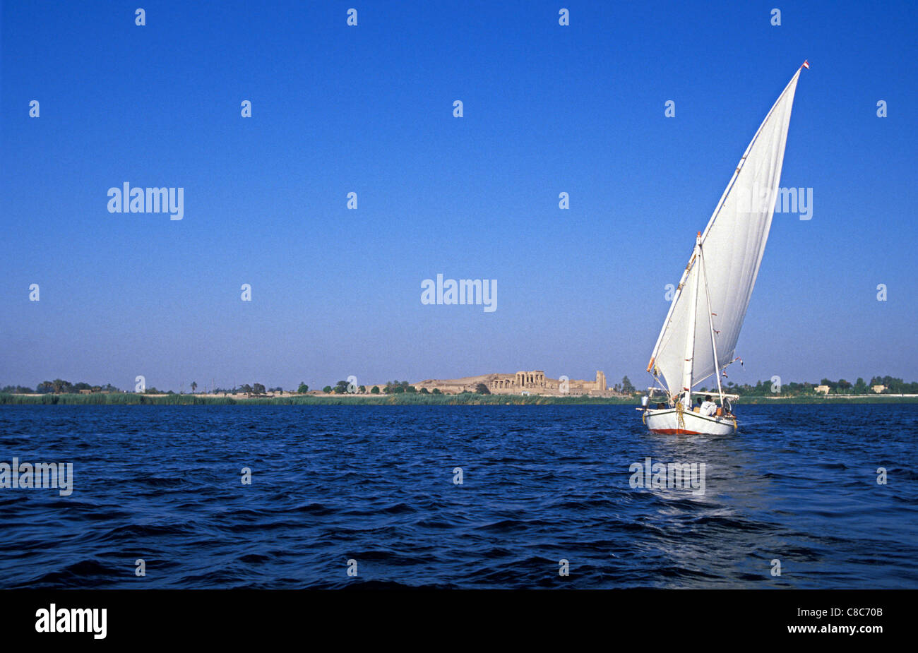Felucca on the Nile with Kom Ombo Temple in the background, Egypt Stock ...