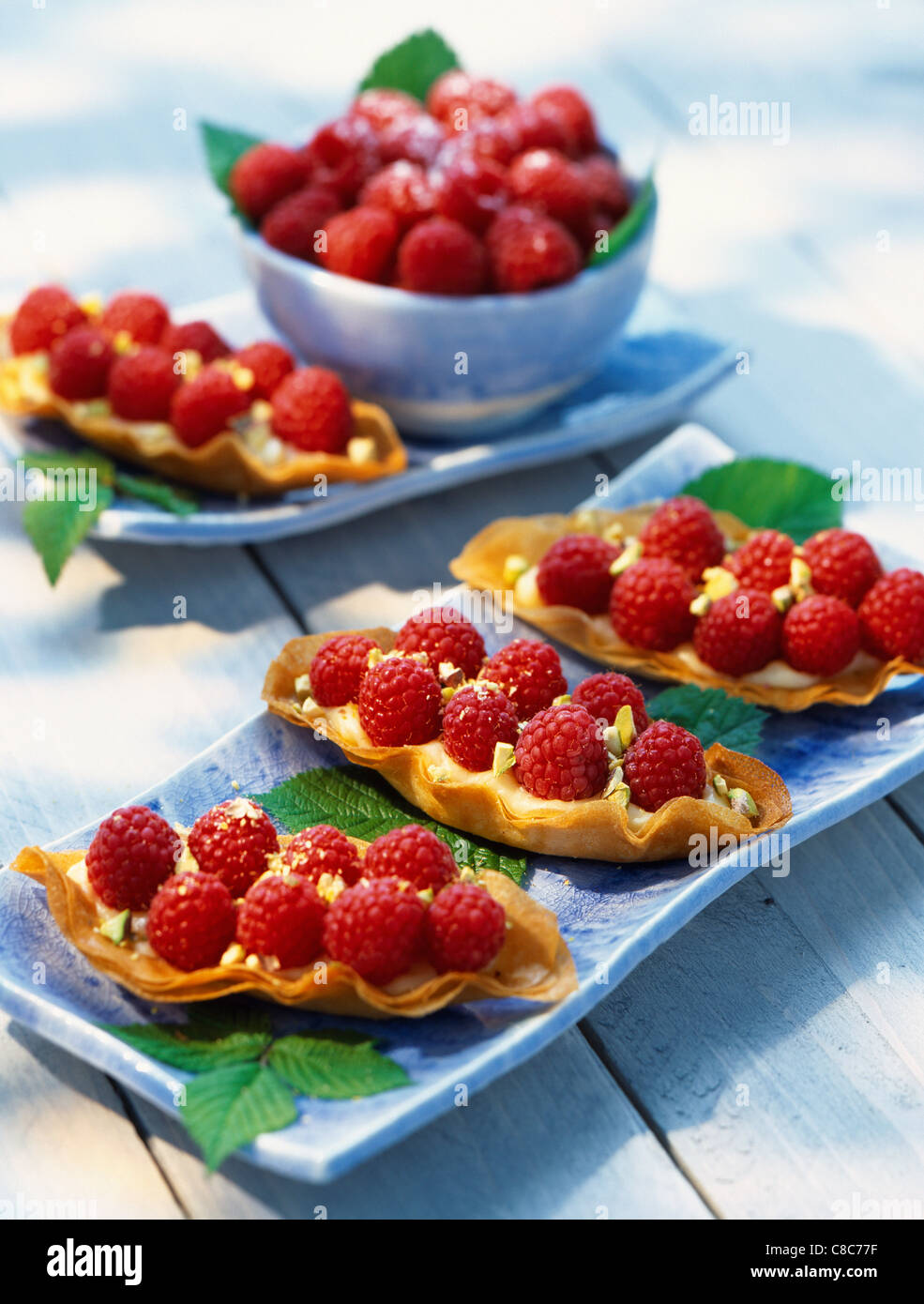 raspberries in filo pastry boats Stock Photo - Alamy